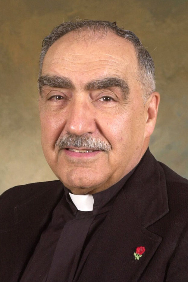 Rev. Michael Sciberras Applause - Herald-Standard